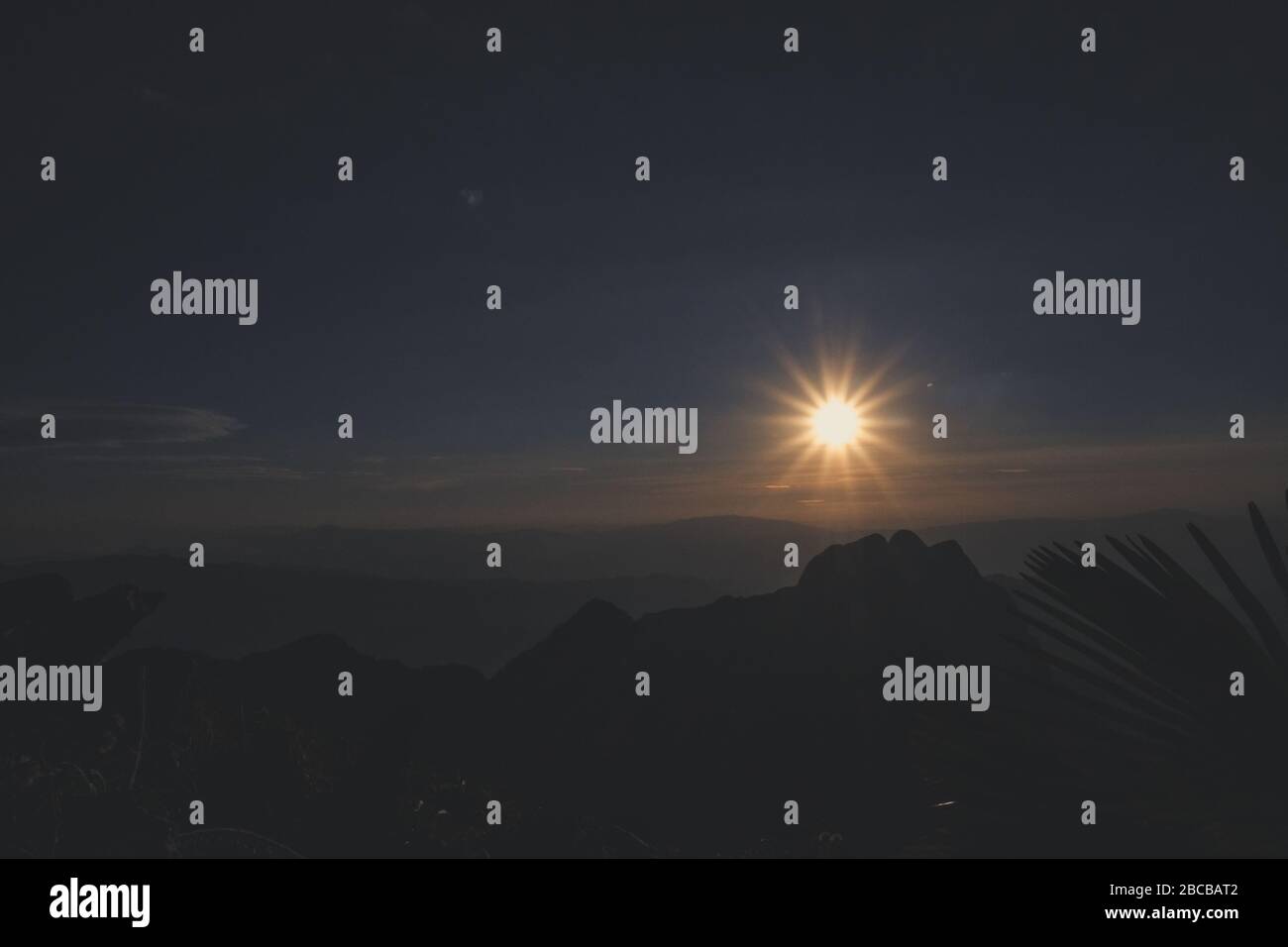 sunrise sky backlit with big mountain Stock Photo - Alamy