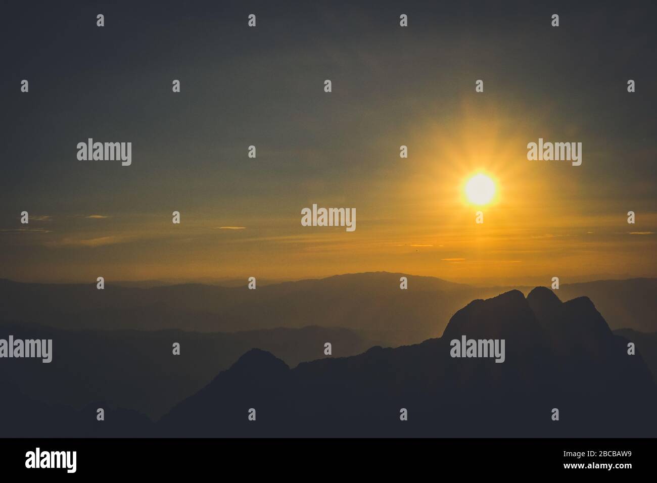 sunrise sky backlit with big mountain Stock Photo - Alamy