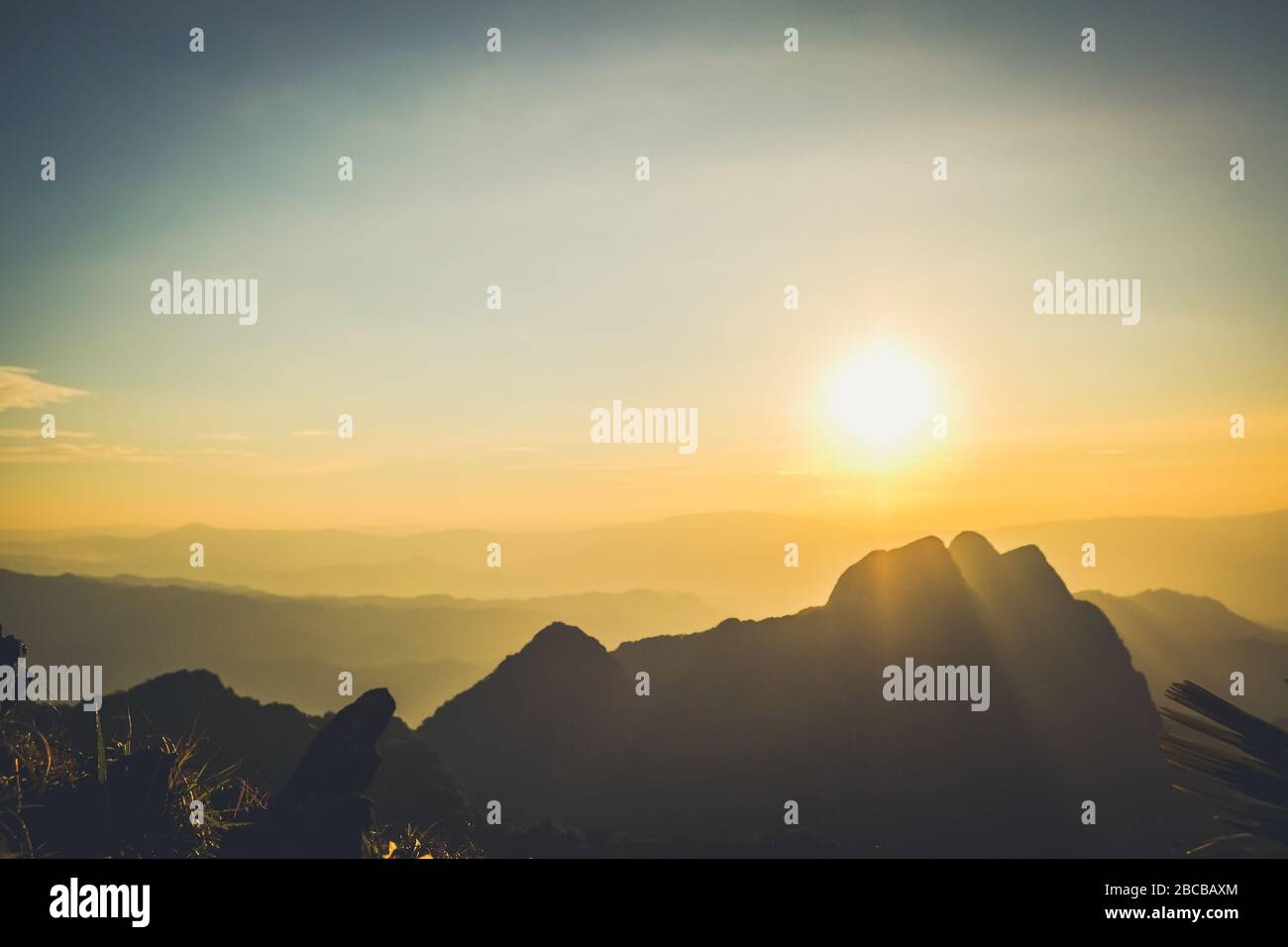 sunrise sky backlit with big mountain Stock Photo - Alamy