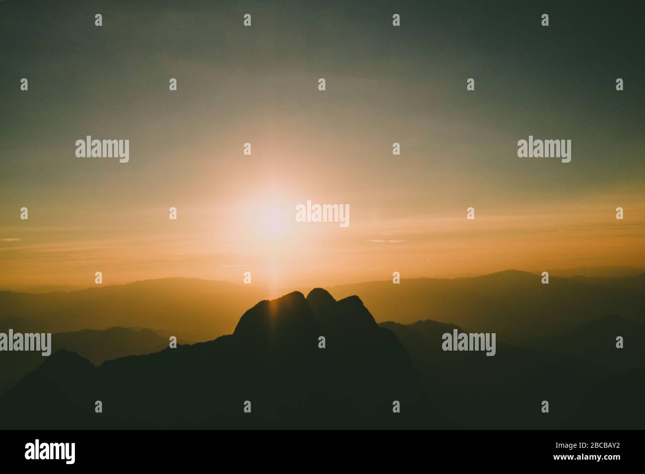 sunrise sky backlit with big mountain Stock Photo - Alamy
