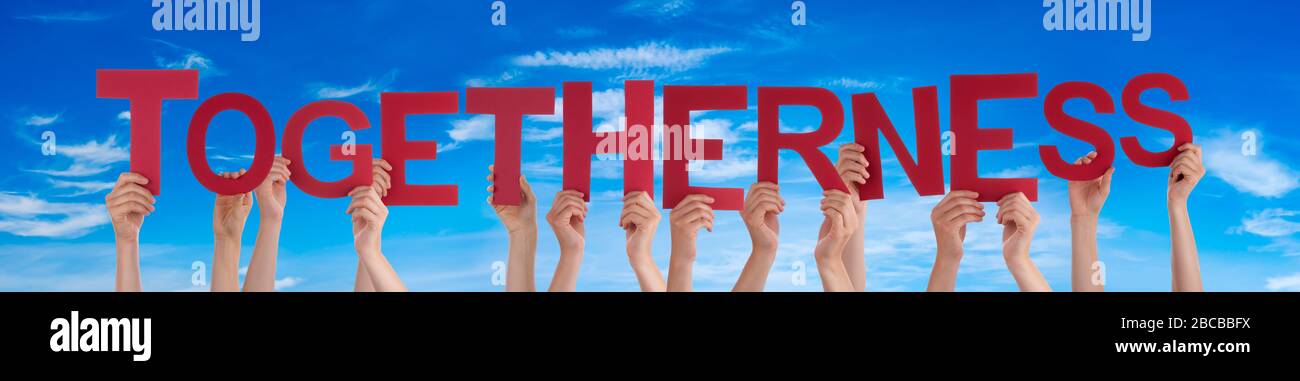 People Hands Holding Word Togetherness, Blue Sky Stock Photo - Alamy