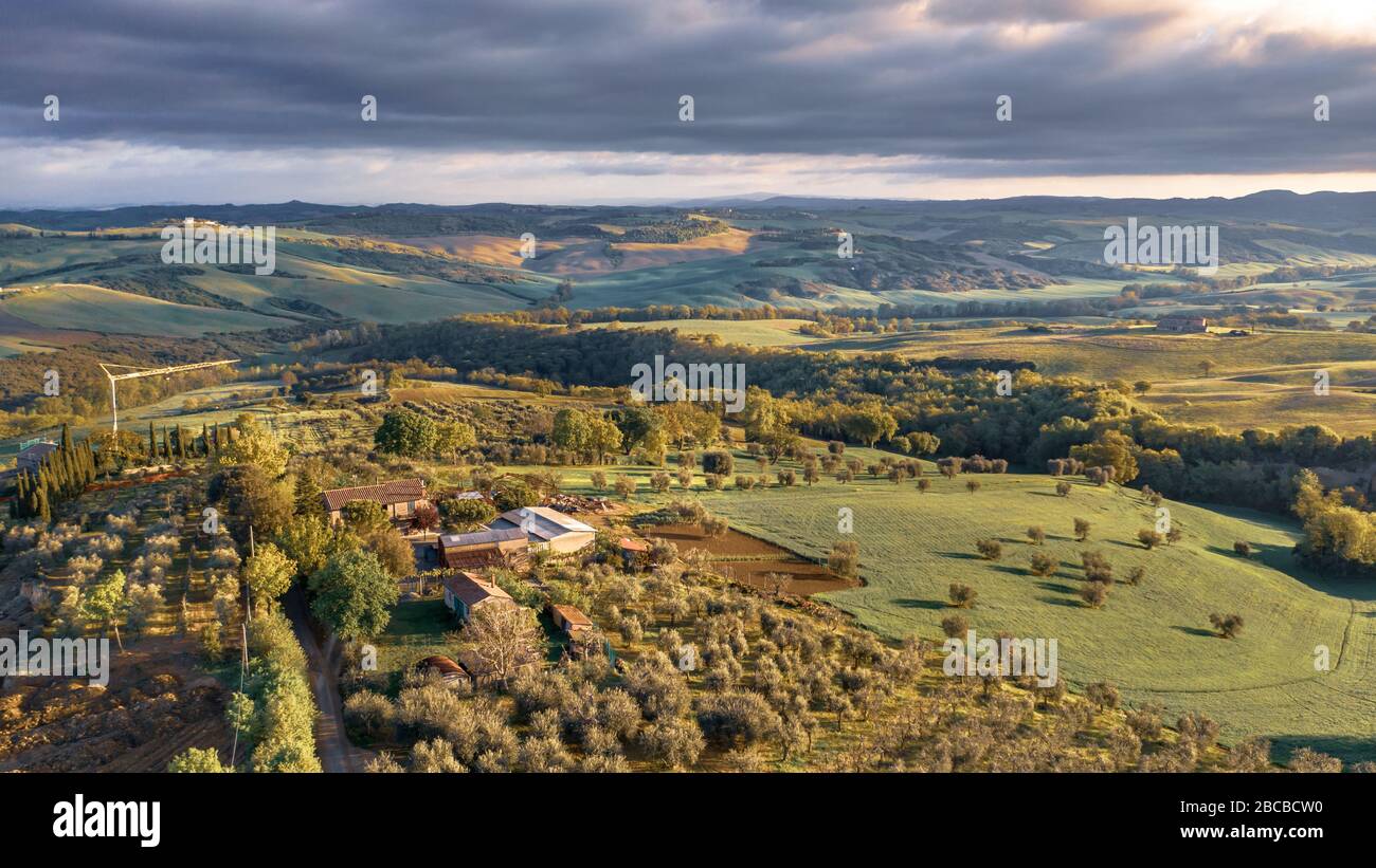 Aerial view of Tuscan countryside on foggy early morning sunrise in ...