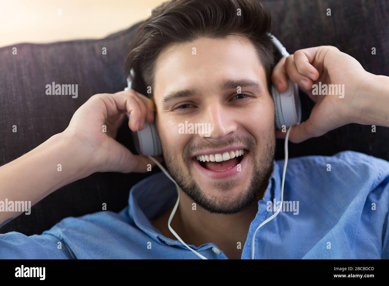 Young guy enjoying time hi-res stock photography and images - Alamy