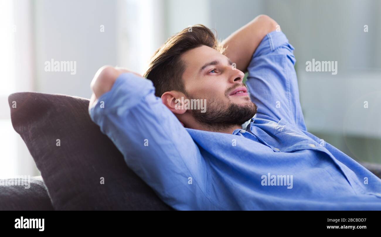 Man relaxing at home hi-res stock photography and images - Alamy