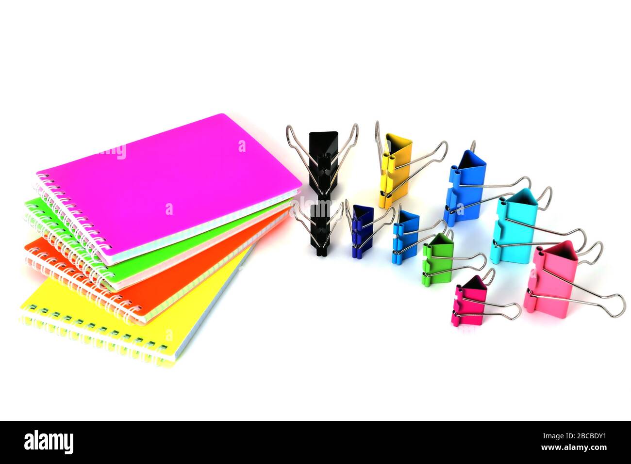 Colorful notepads clip for paper on a white background in the correct ...