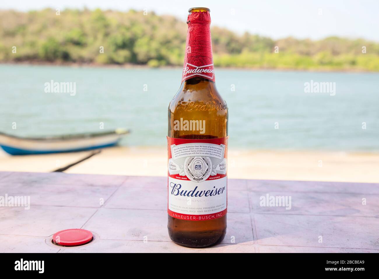 Arambol, Goa, India, 19 March, 2020: Budweiser beer bottle on the beach ...