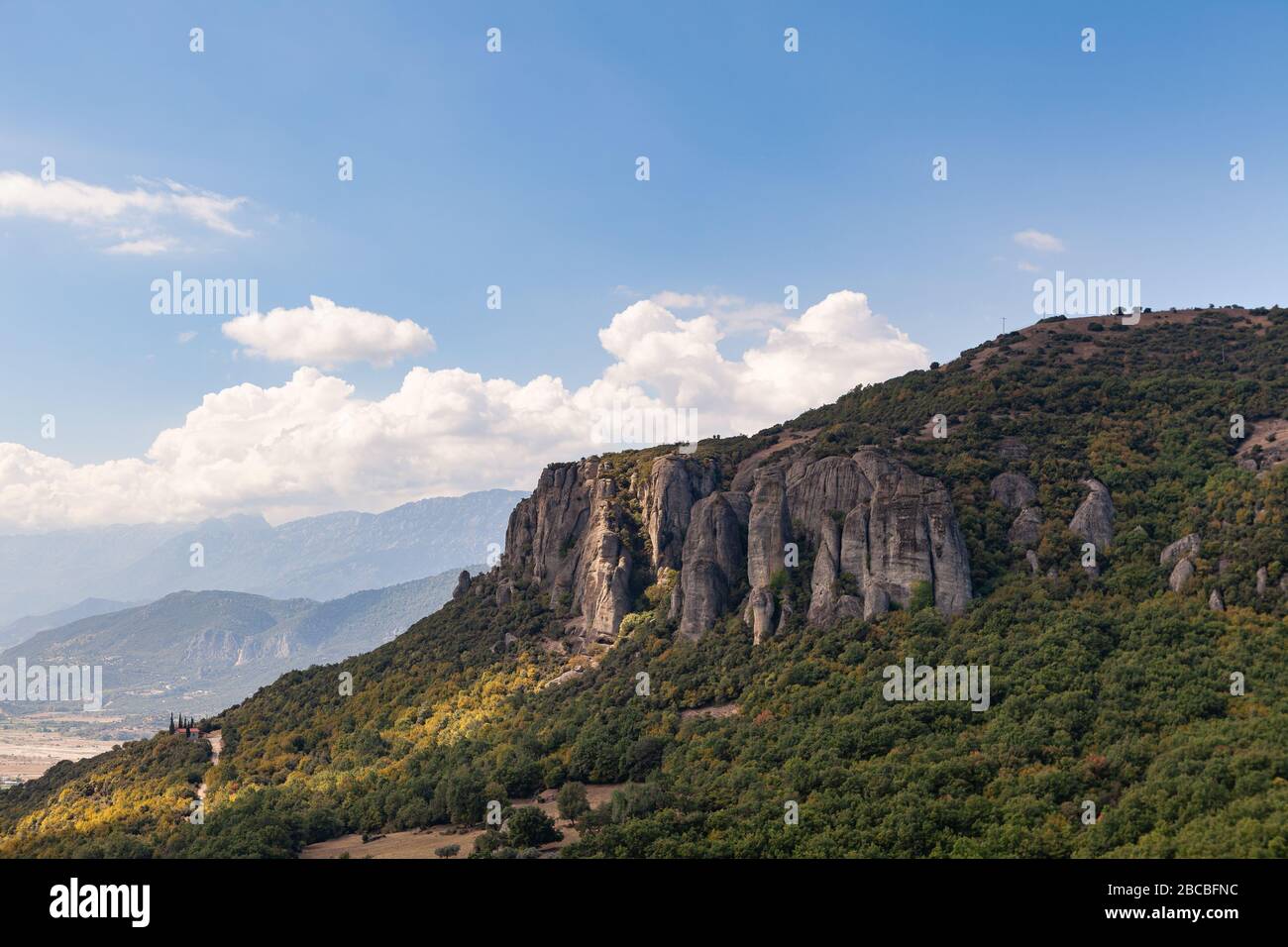 Meteora rocks with monasteries, Greece. Summer daytime Stock Photo - Alamy