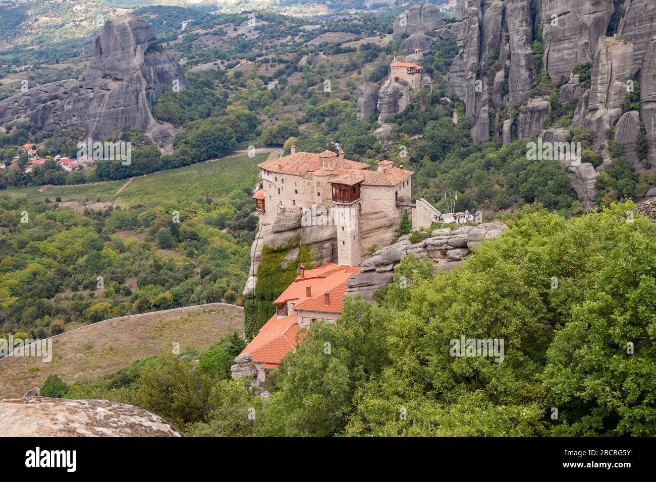 Meteora rocks with monasteries, Greece. Summer daytime Stock Photo - Alamy