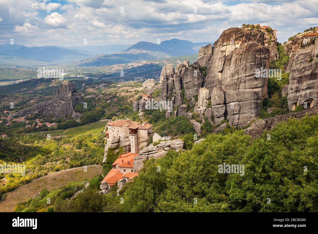 Meteora rocks with monasteries, Greece. Summer daytime Stock Photo - Alamy