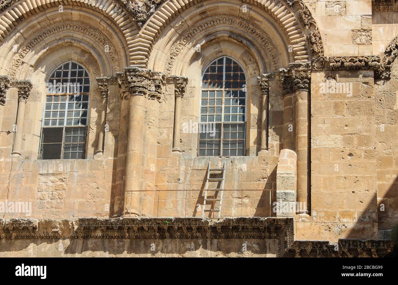 Wooden staircase by the window above the entrance to the temple of the ...