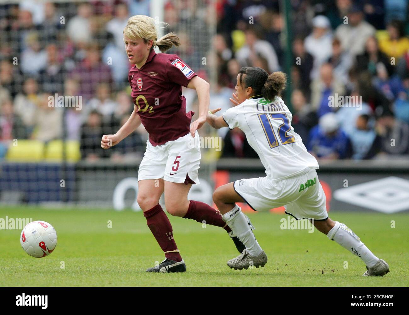 Arsenal's Leanne Champ (left) brings the ball away from Jess Clarke ...