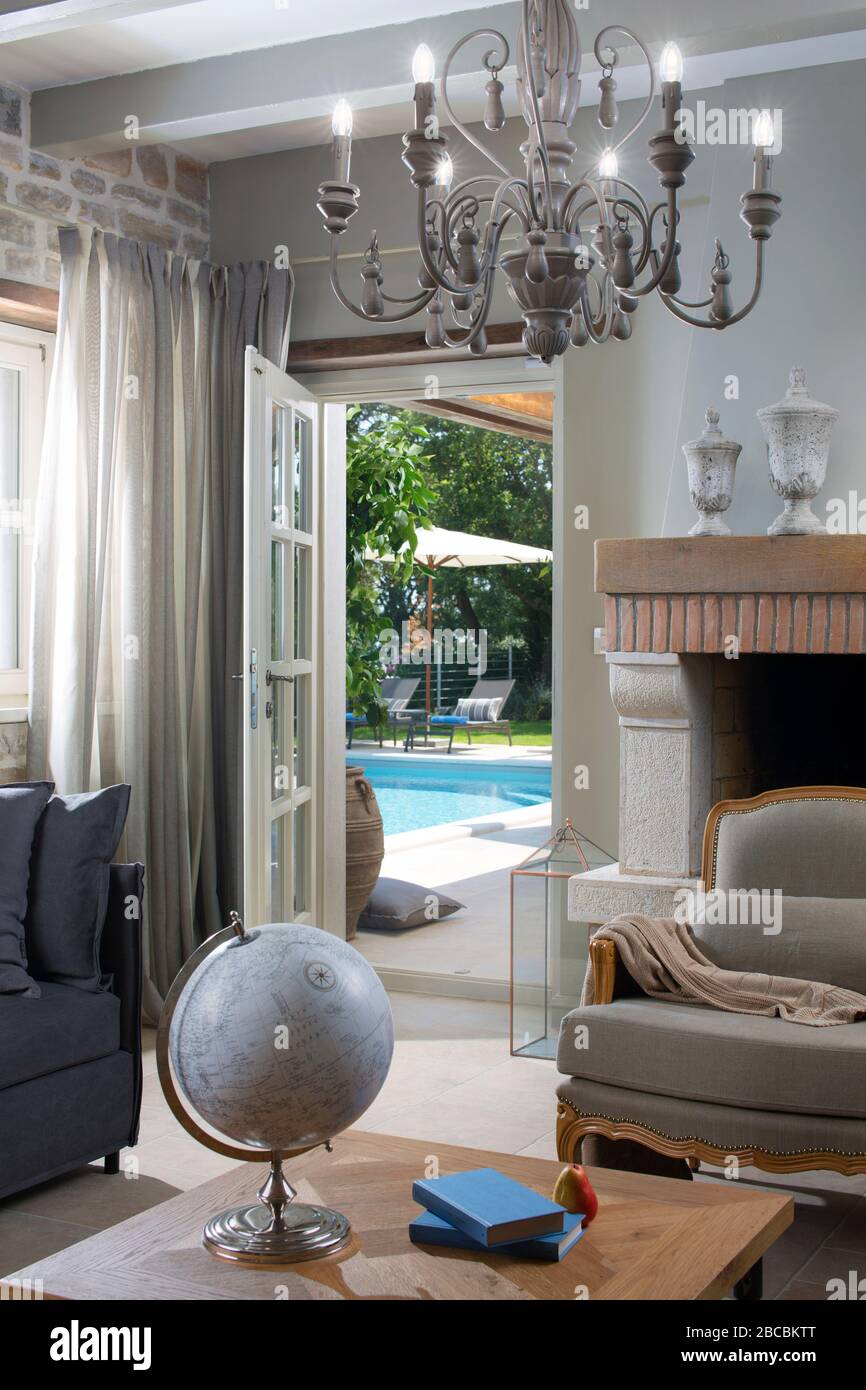 Living room with view of pool hi-res stock photography and images - Alamy