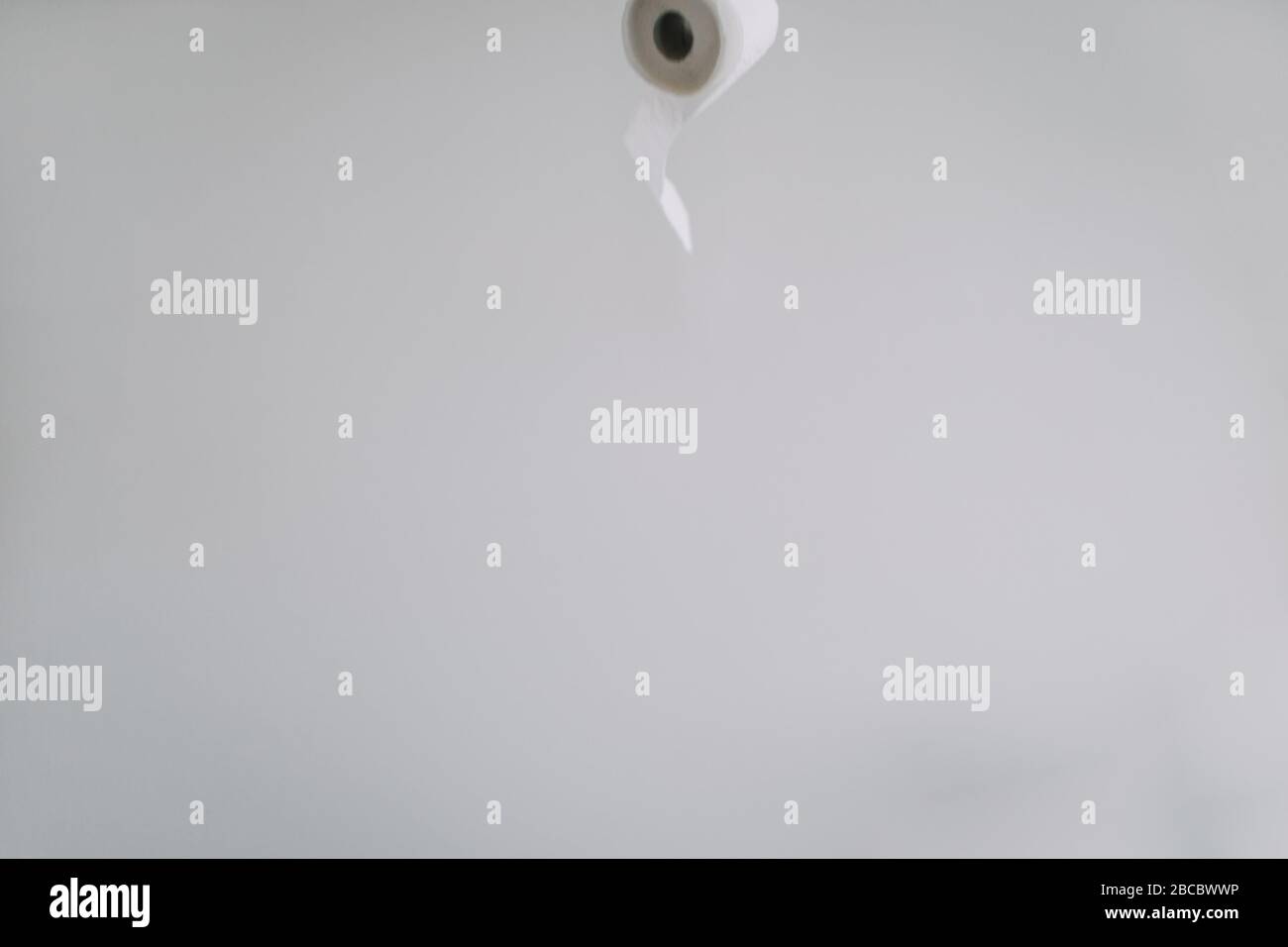 artistic concept shot of flying blurry toilet paper roll Stock Photo ...