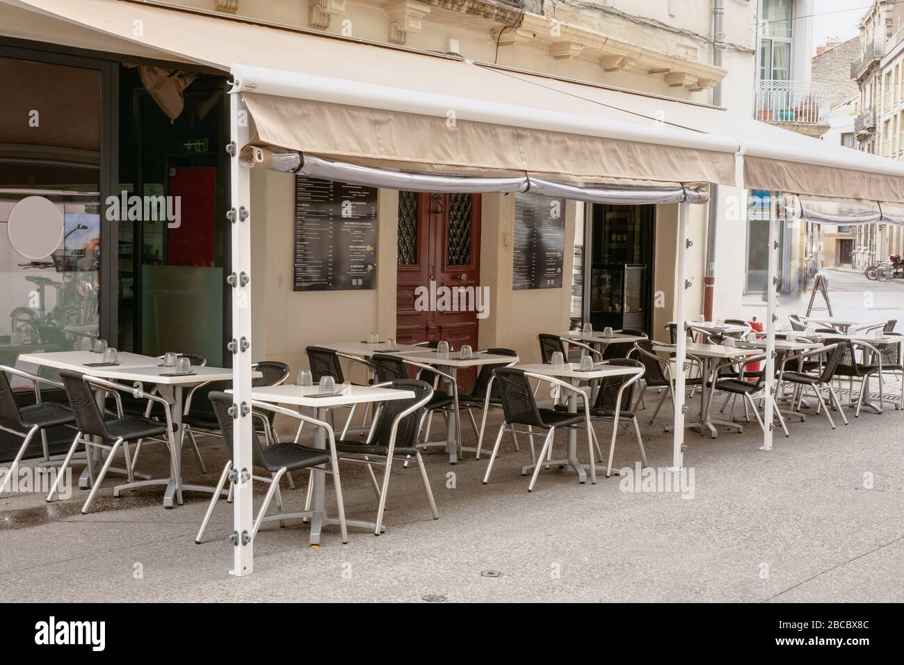 Terrace of a restaurant in a street Stock Photo - Alamy