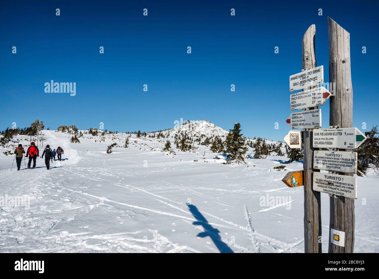 Bilingual trail signs on trail, running along Polish-Czech border ...