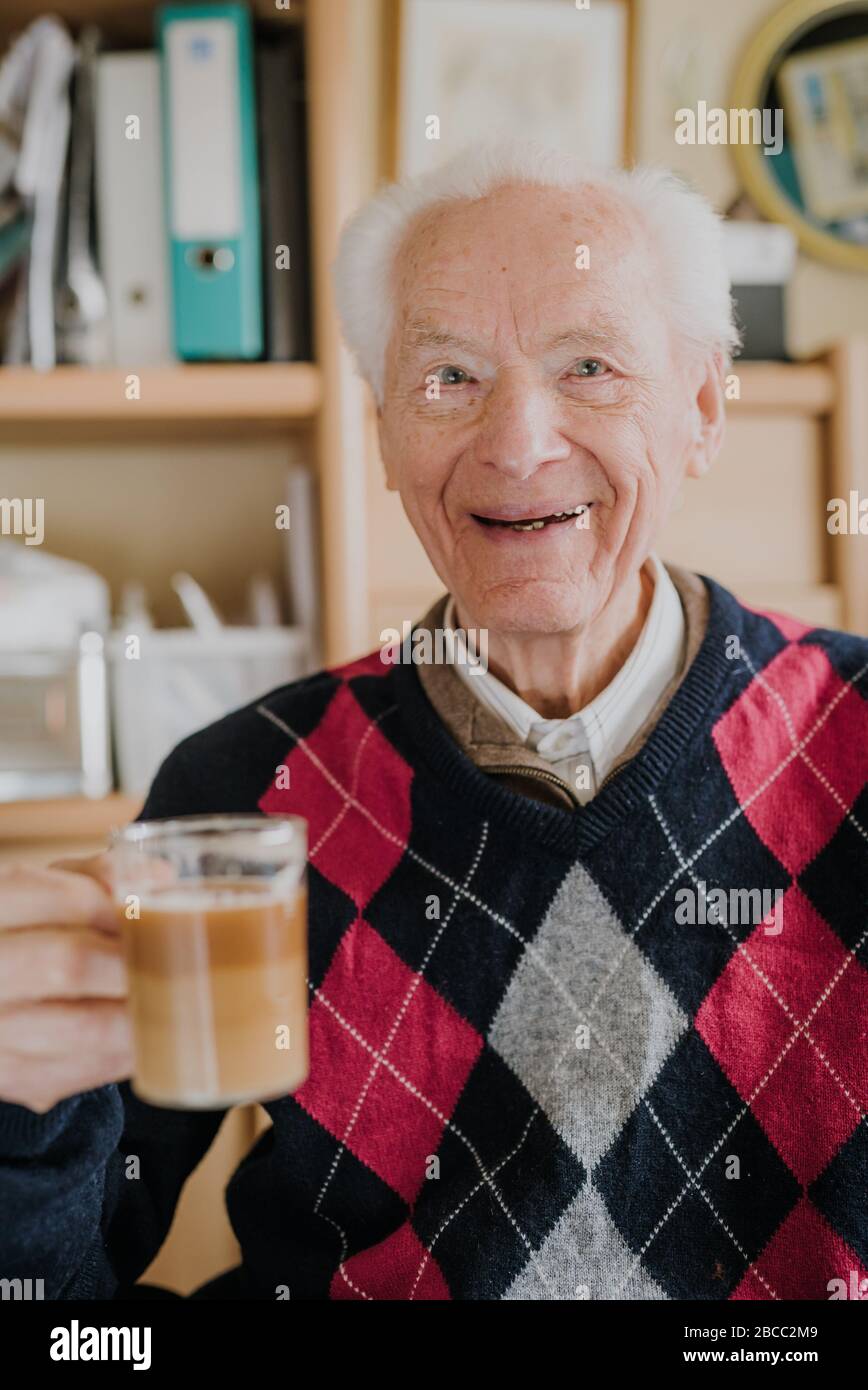 Old man drinking coffee hi-res stock photography and images - Alamy