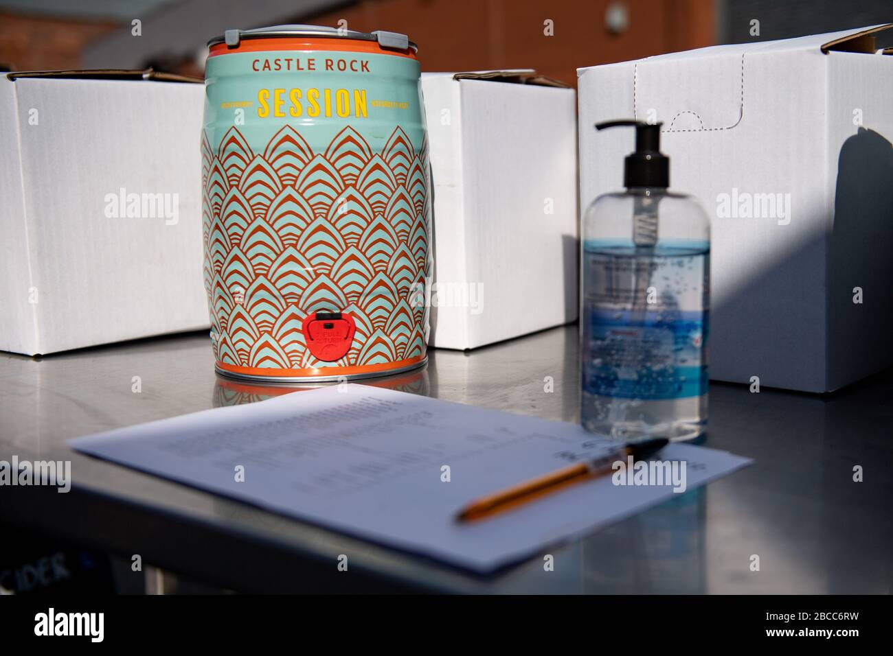 Staff at the Castle Rock Brewery operating a drive-thru beer collection ...