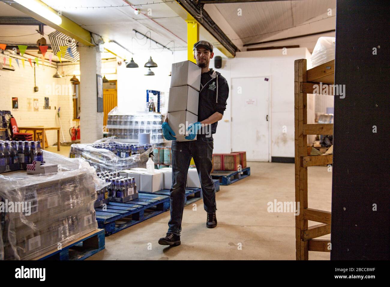 Staff at the Castle Rock Brewery operating a drive-thru beer collection ...