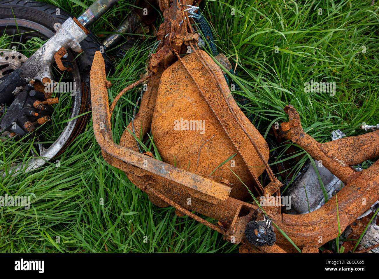 Dumped burnt out motorcycle Stock Photo - Alamy