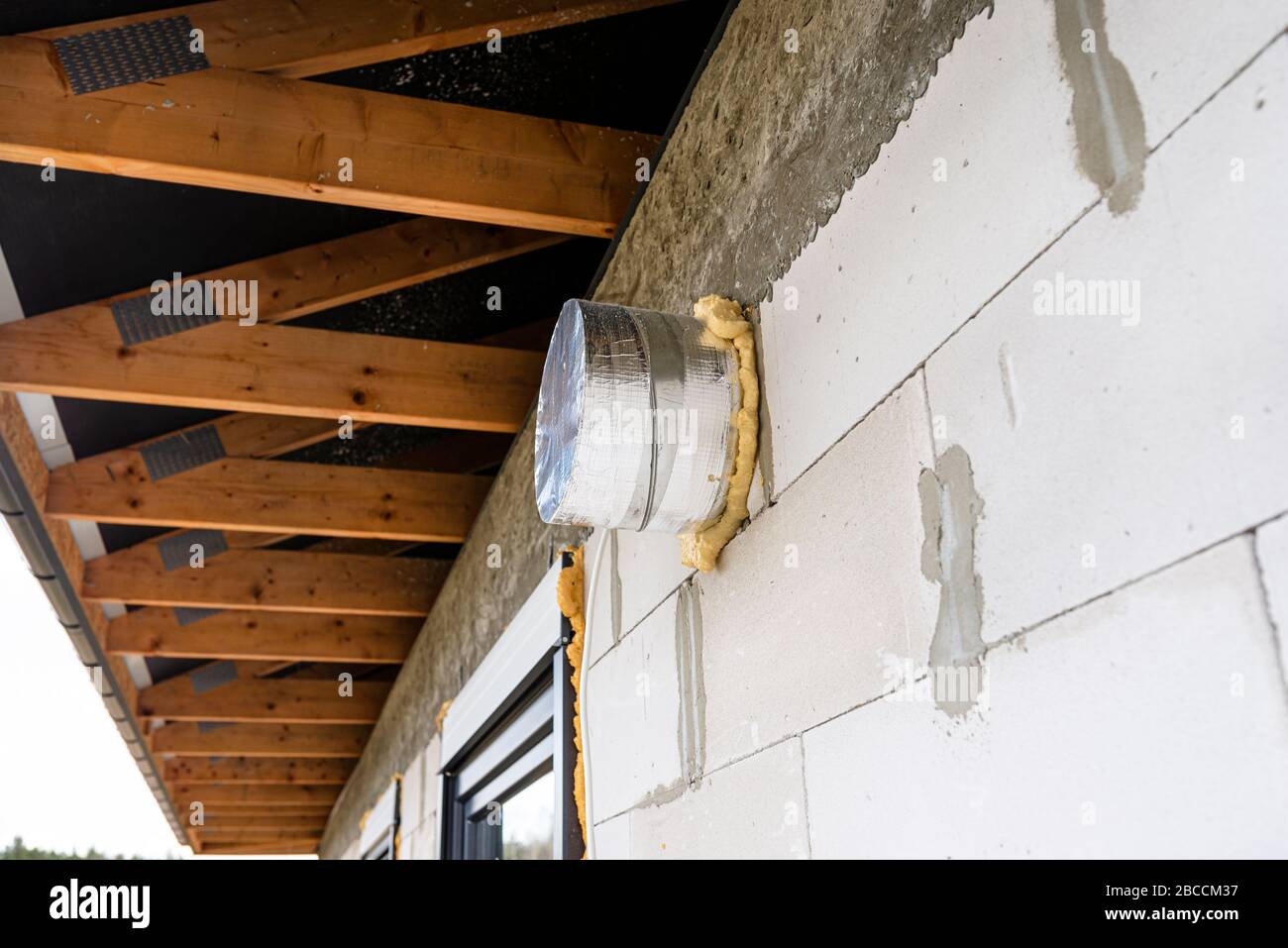 Air intake and air outlet in the wall of a single-family house to the ...