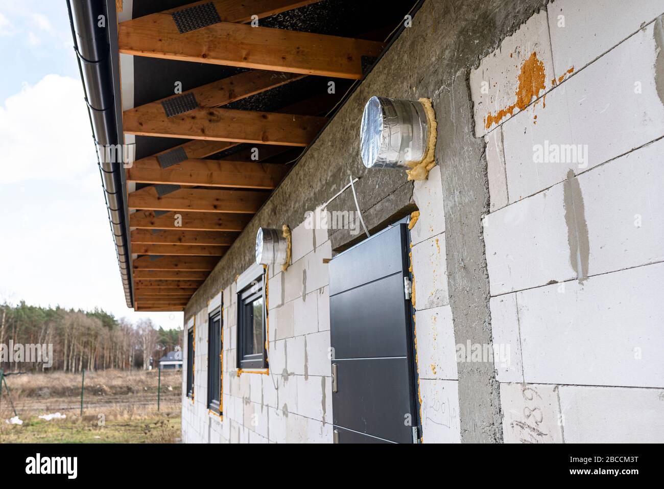 Air intake and air outlet in the wall of a single-family house to the ...