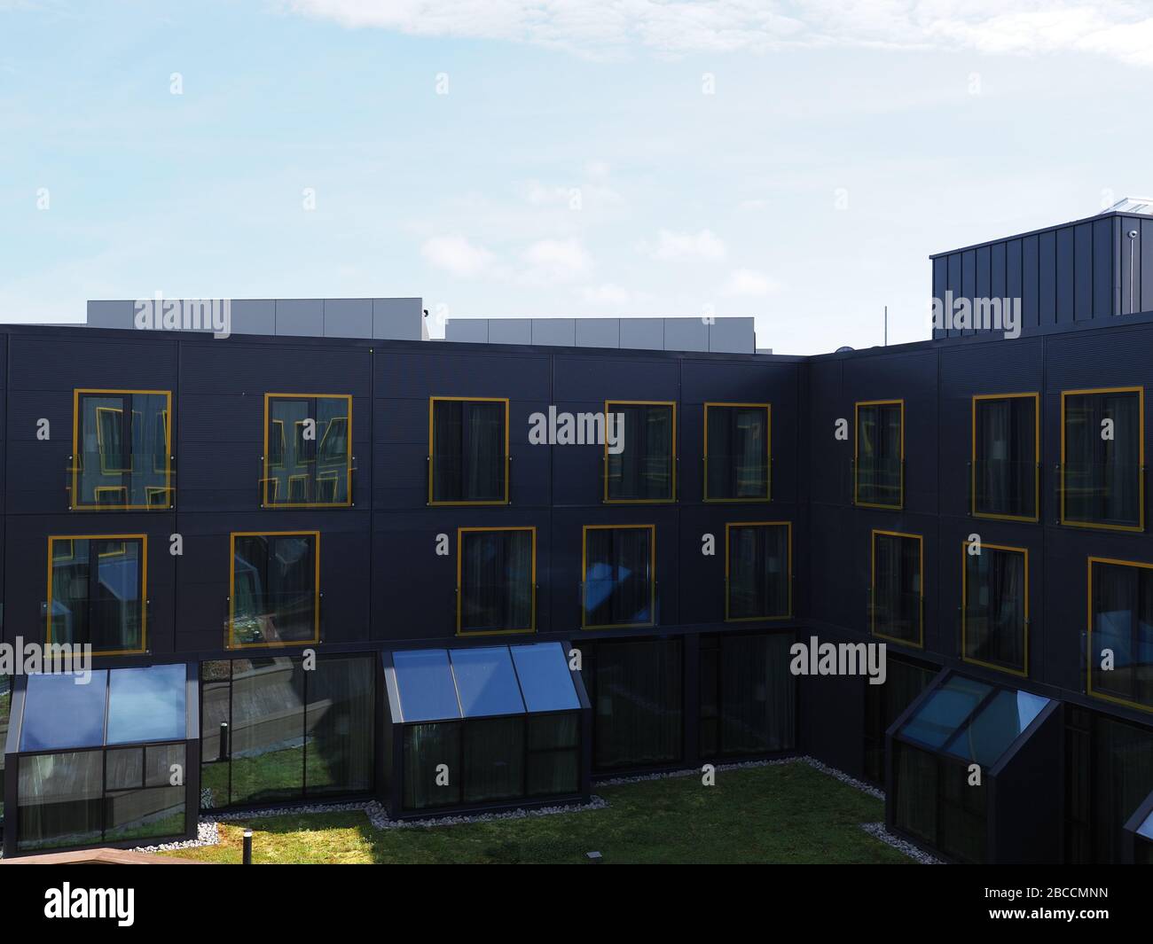 Close up on elevation with covered windows in Bergen city in Norway ...