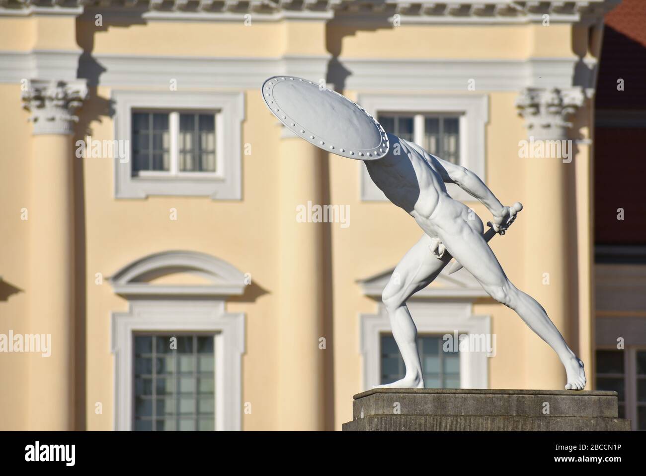 Statue of a man with a shield at schloss Charlottenburg palace in ...