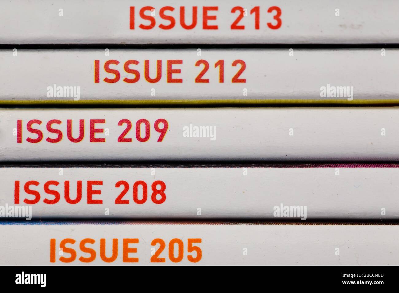 Macro close up view of issue number in red and purple across horizontal ...
