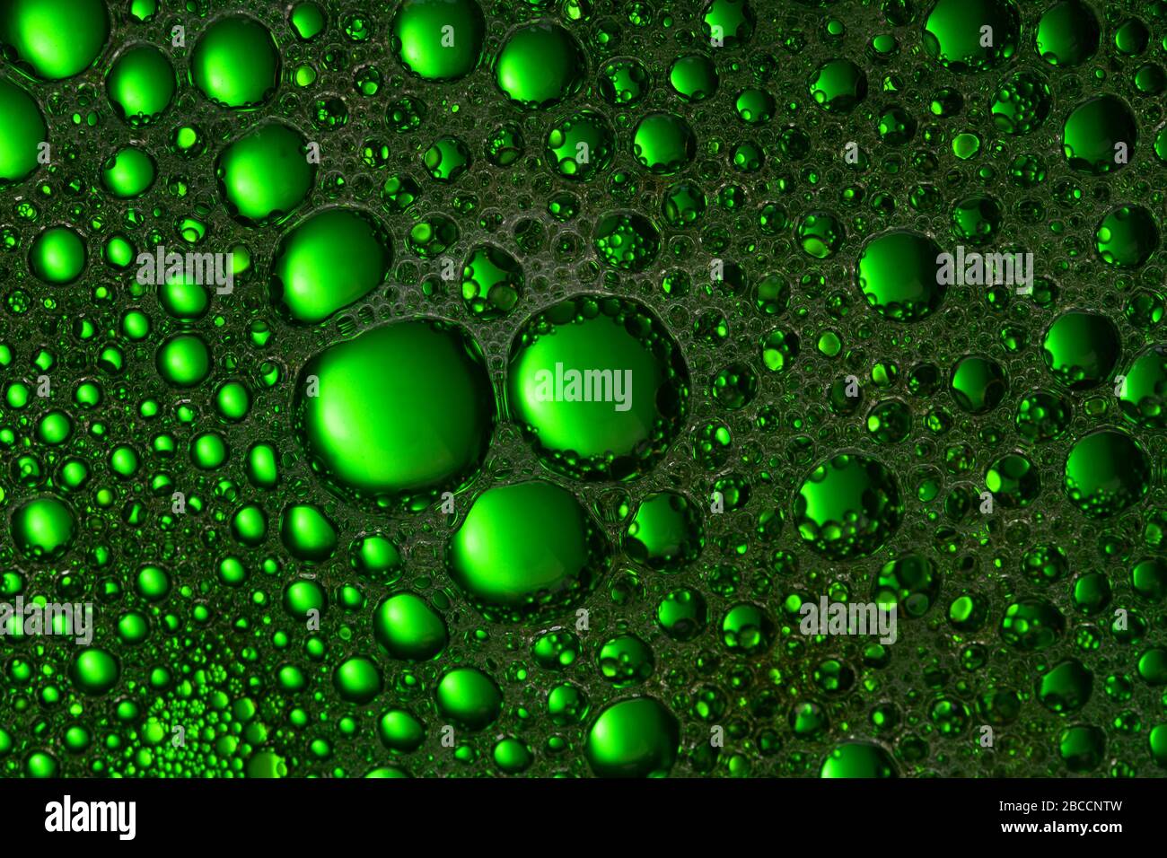 Abstract liquid background green color. Close up Stock Photo - Alamy