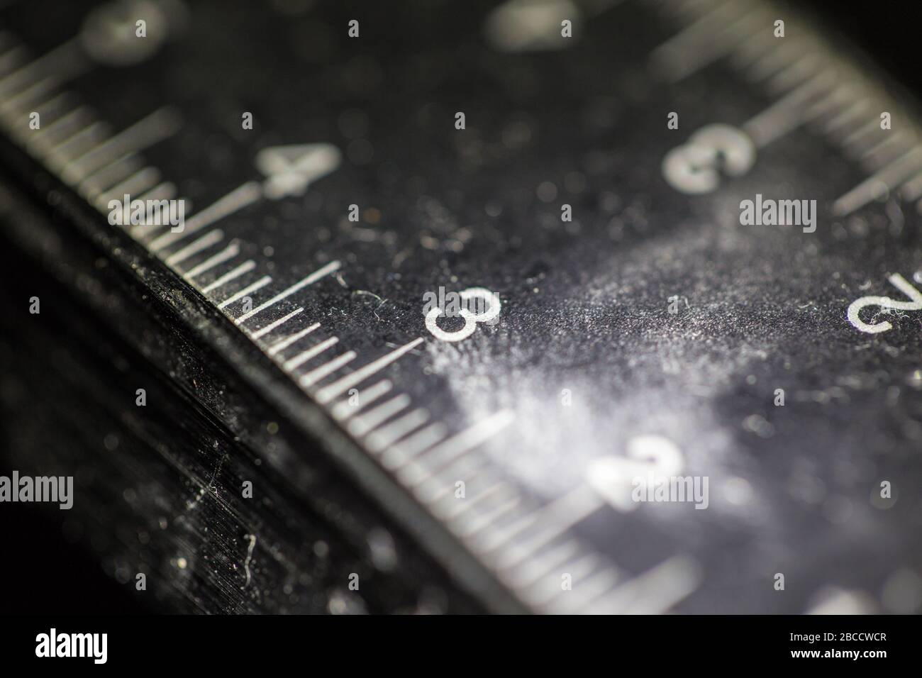 Macro view of old and worn measuring instrument units in inches ...