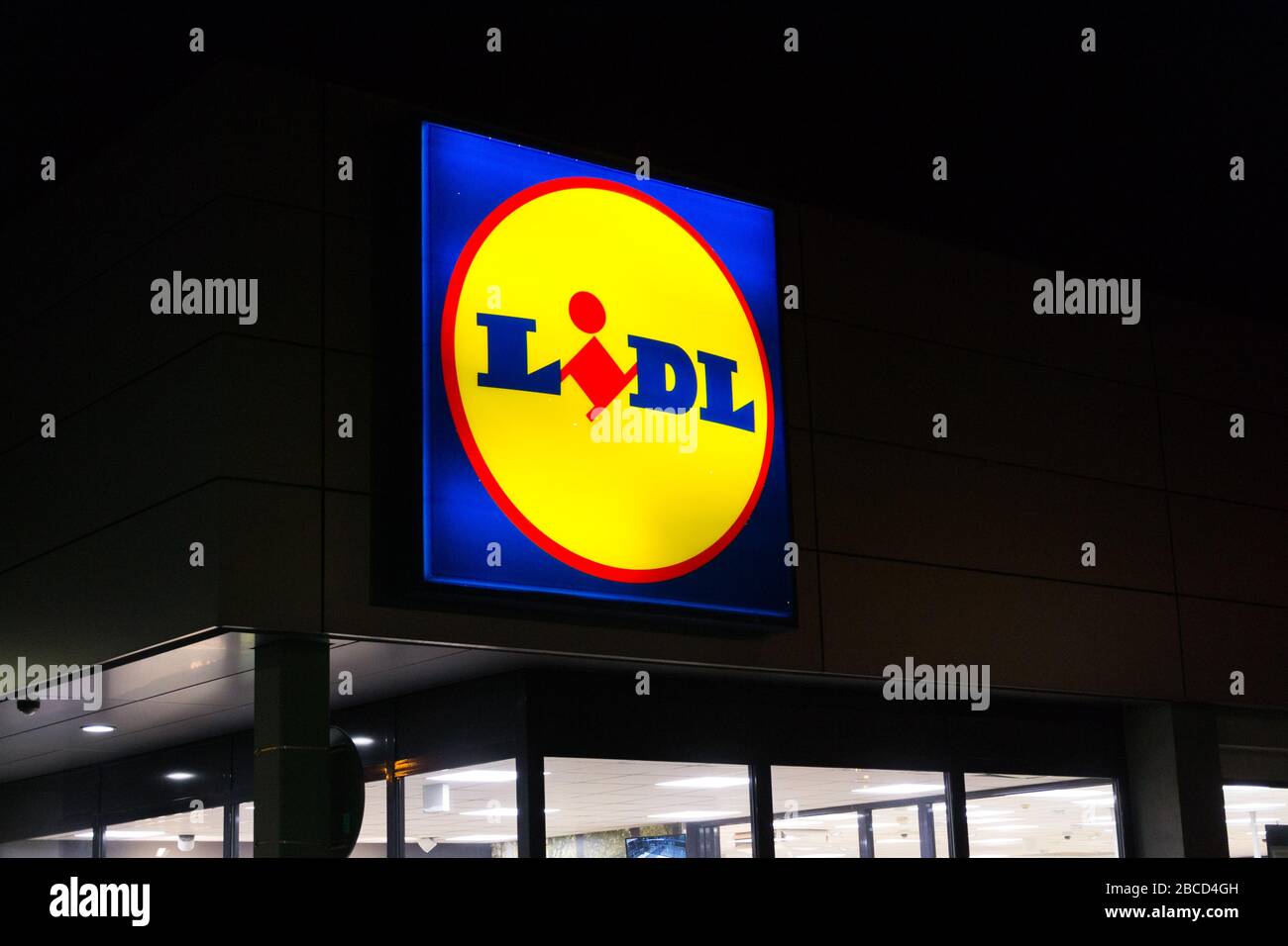 PRAGUE, CZECH REPUBLIC - APRIL 3 2020: LIDL company logos at night on ...