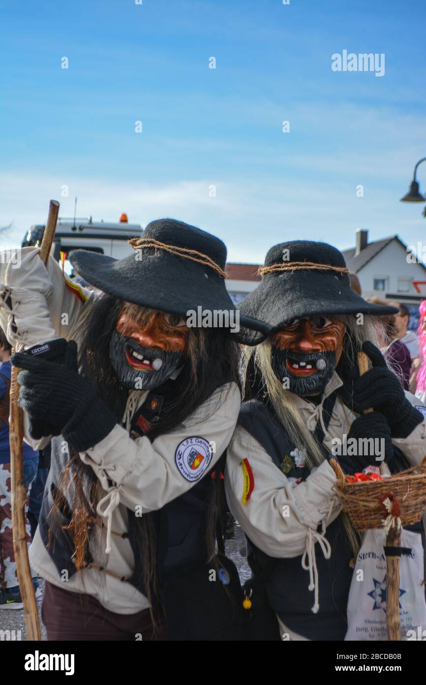 Two witches hug each other. Street Carnival in Southern Germany - Black ...