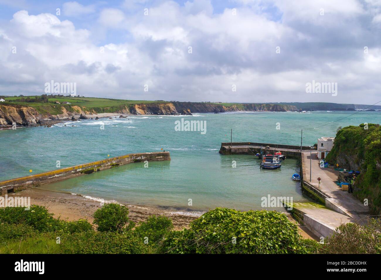 Tiny harbour in Boatstrand a coastal small village in County Waterford ...