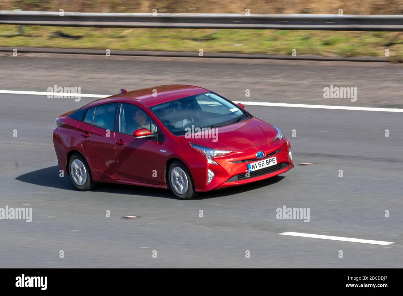 Red toyota prius on road hi-res stock photography and images - Alamy