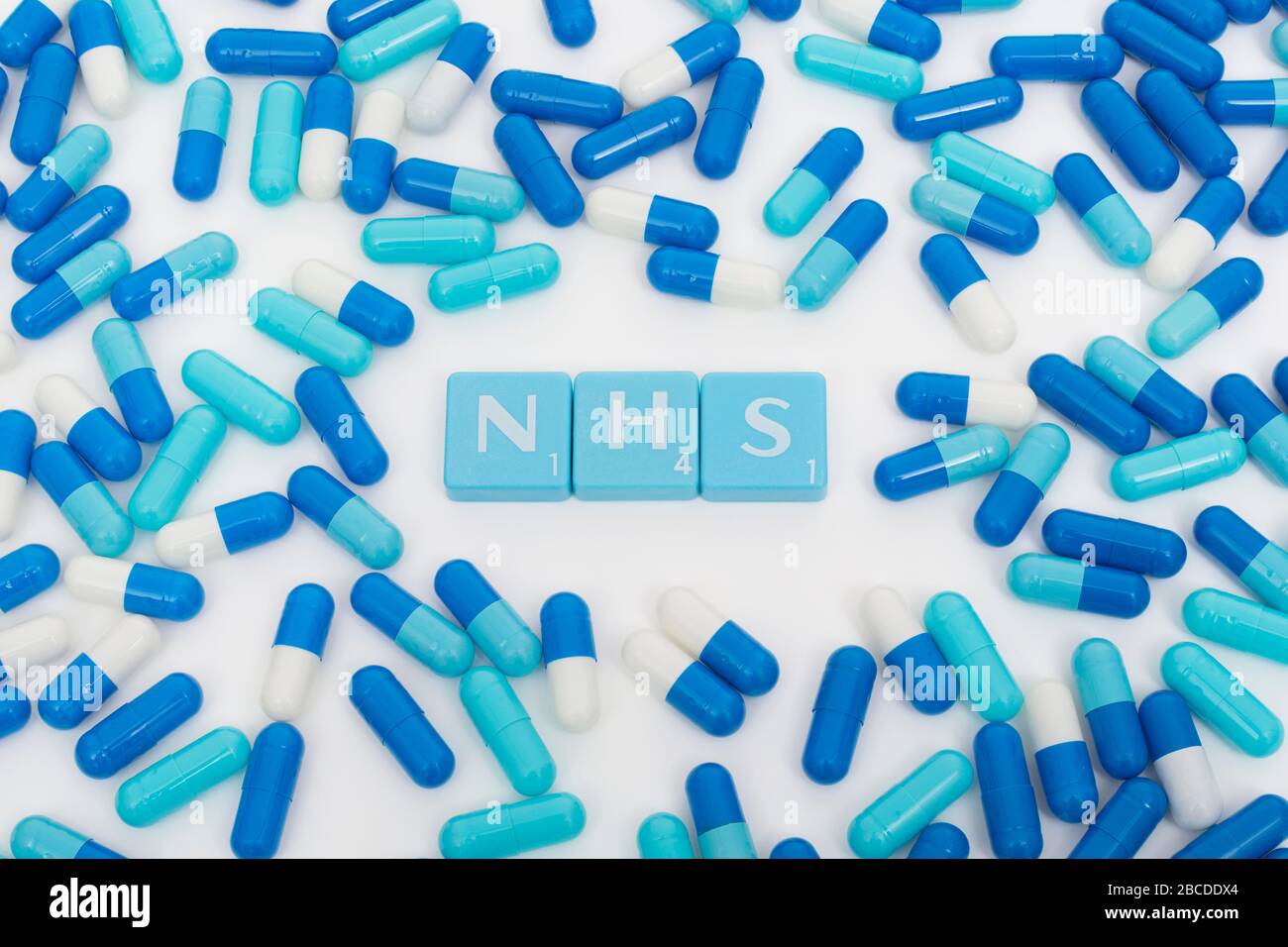 NHS letters tiles & assorted blue pills. For NHS 75th birthday, NHS ...