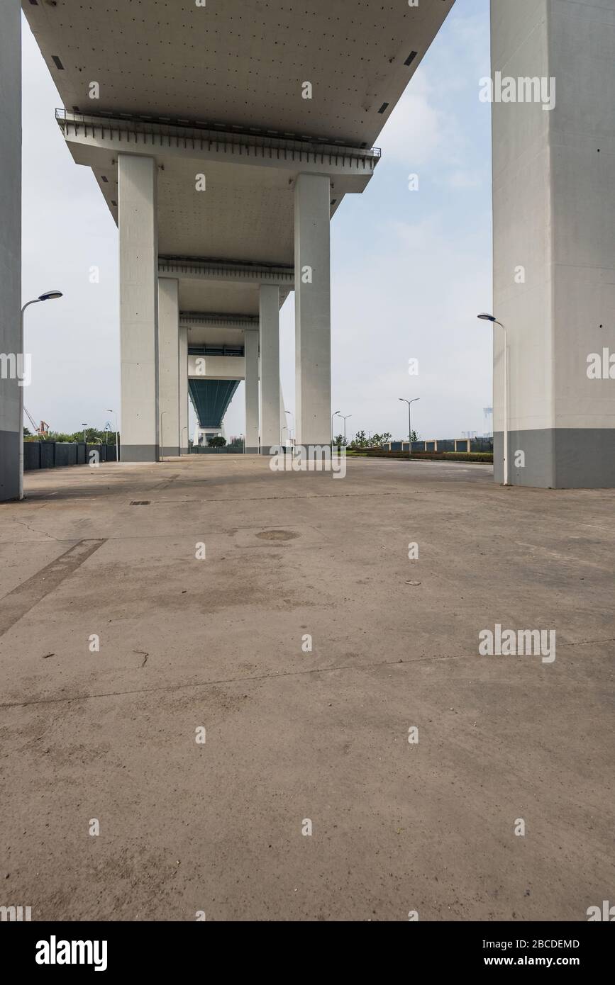 Under the pier at concrete ground Stock Photo - Alamy