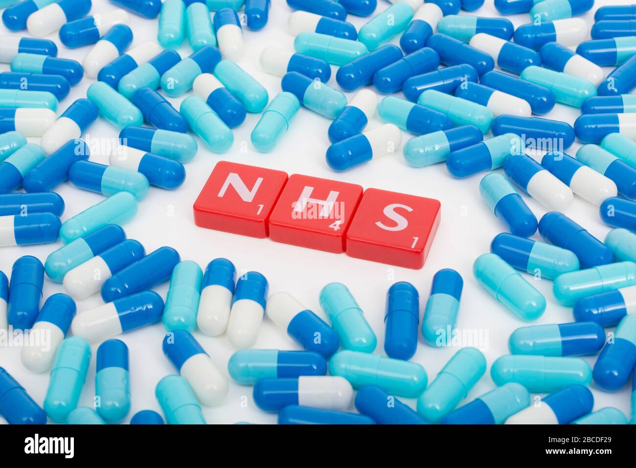 NHS letters tiles & assorted blue pills. For NHS 75th birthday, NHS ...