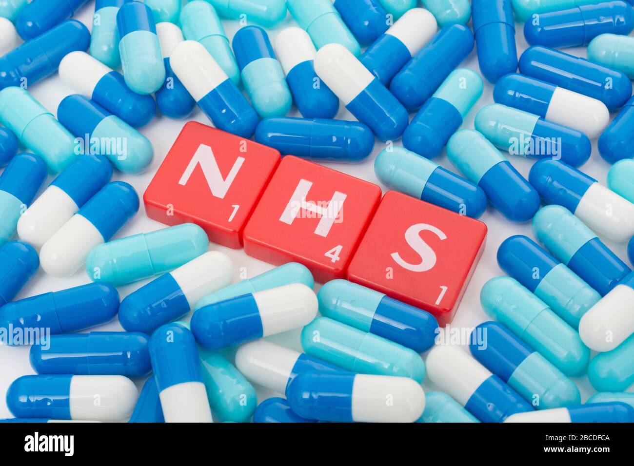 NHS letters tiles & assorted blue pills. For NHS 75th birthday, NHS ...