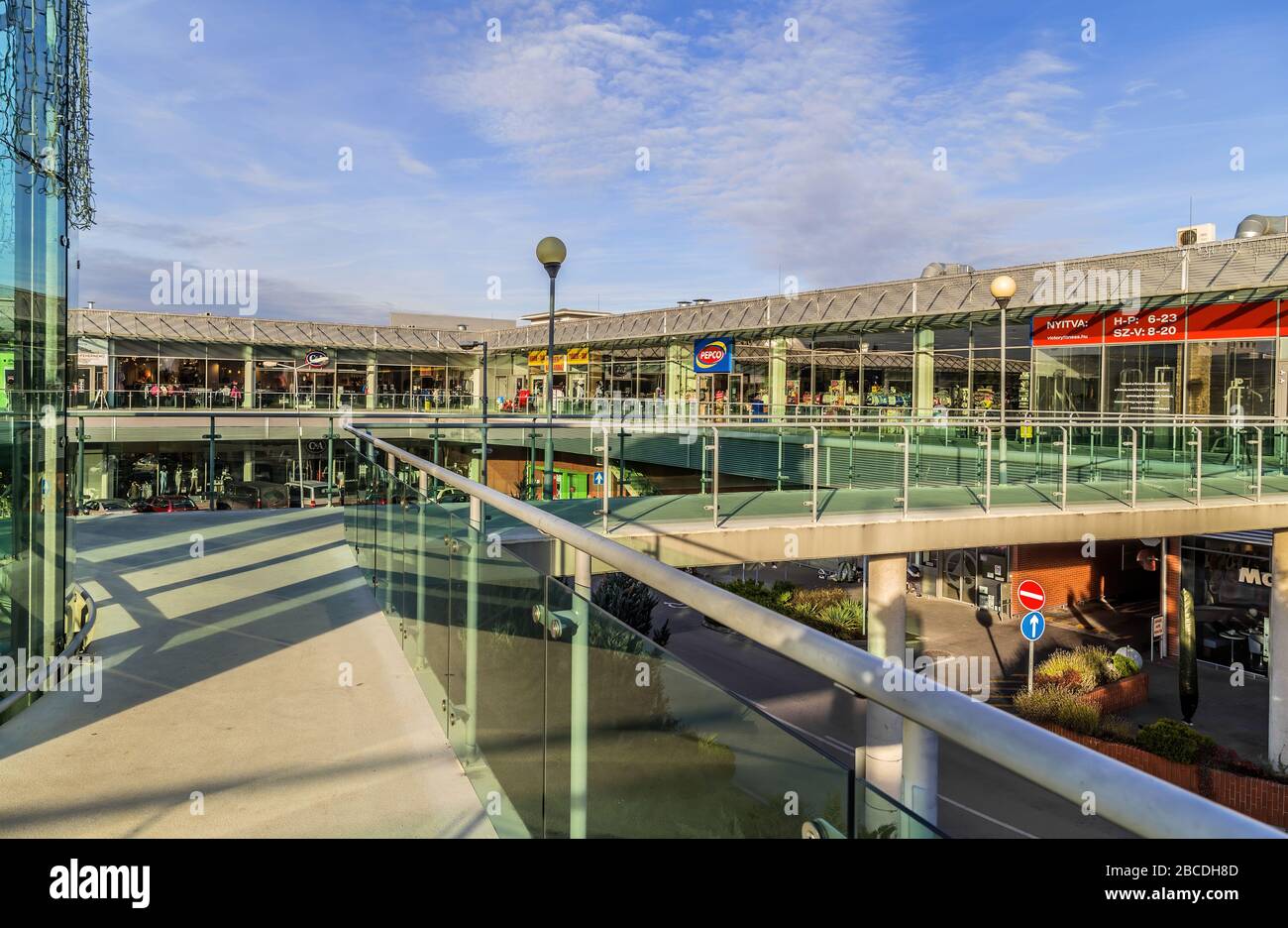 The modern complex of the shopping center and bus station at Érd ...