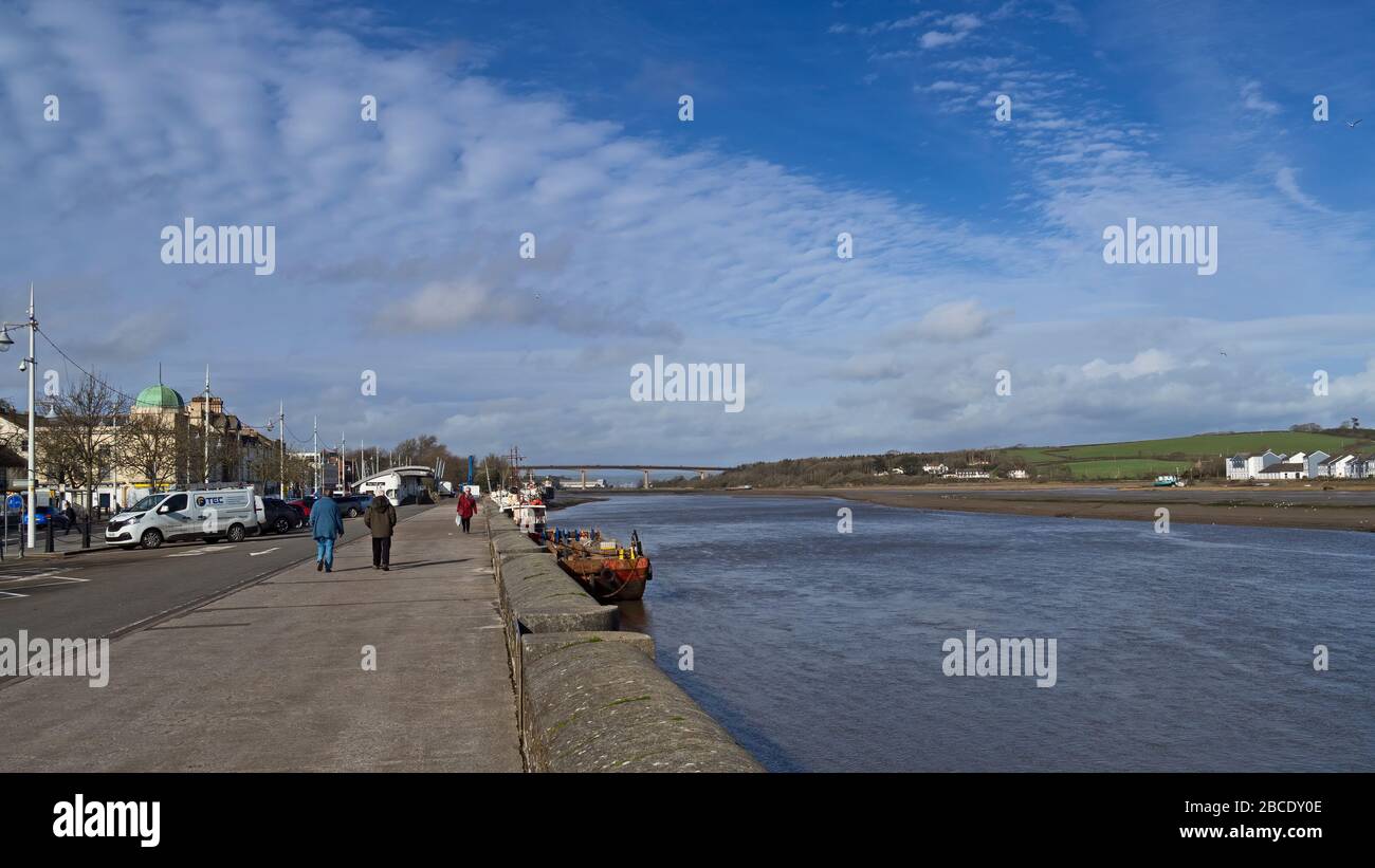 BIDEFORD, NORTH DEVON, ENGLAND, UK - MARCH 11 2020: People enjoying the ... BIDEFORD, NORTH DEVON, ENGLAND, UK - MARCH 11 2020: People enjoying the ...