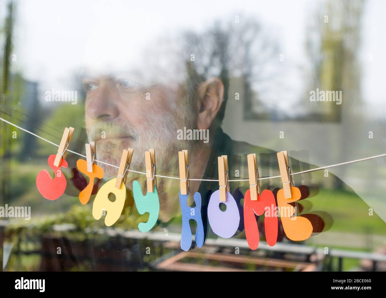 Man behind window hi-res stock photography and images - Alamy