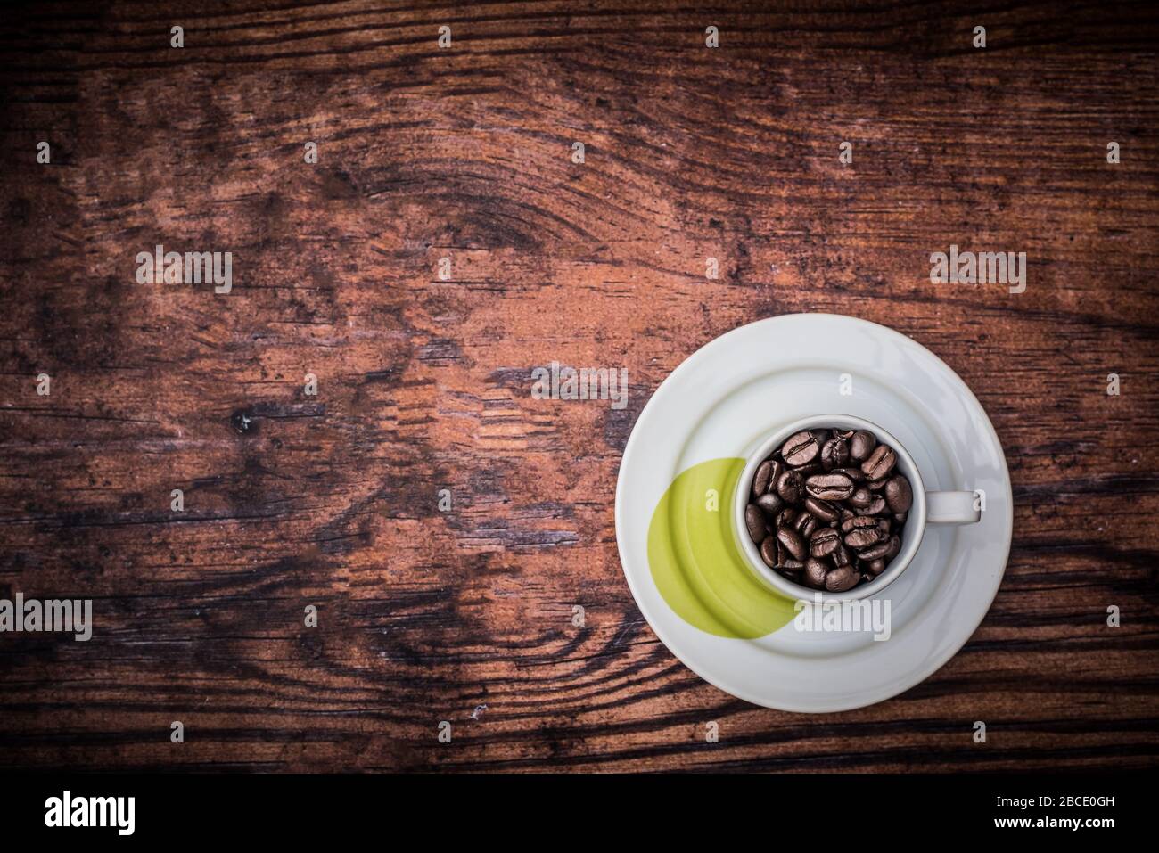 Flat Lay - Coffee & coffee beans in cup and saucer Stock Photo - Alamy