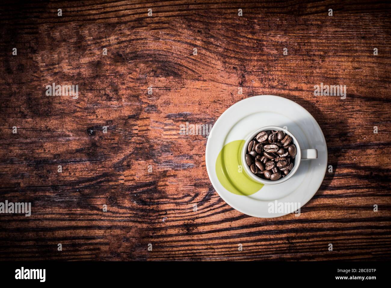 Flat Lay - Coffee & coffee beans in cup and saucer Stock Photo - Alamy