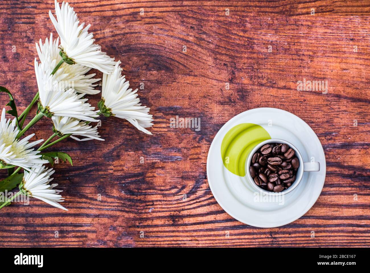 Flat Lay - Coffee & coffee beans in cup and saucer Stock Photo - Alamy