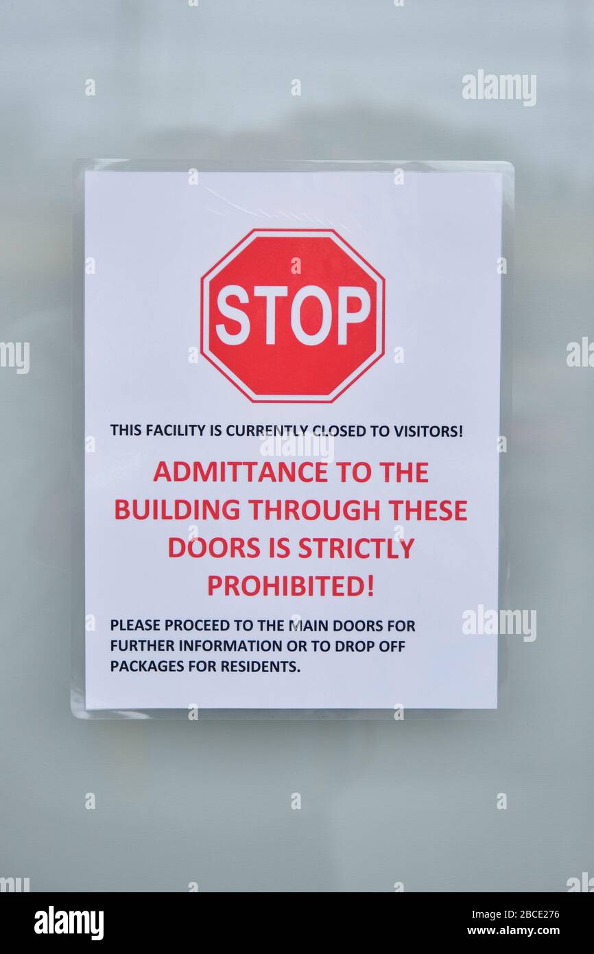 Sign posted on the doors of a retirement community warning potential ...
