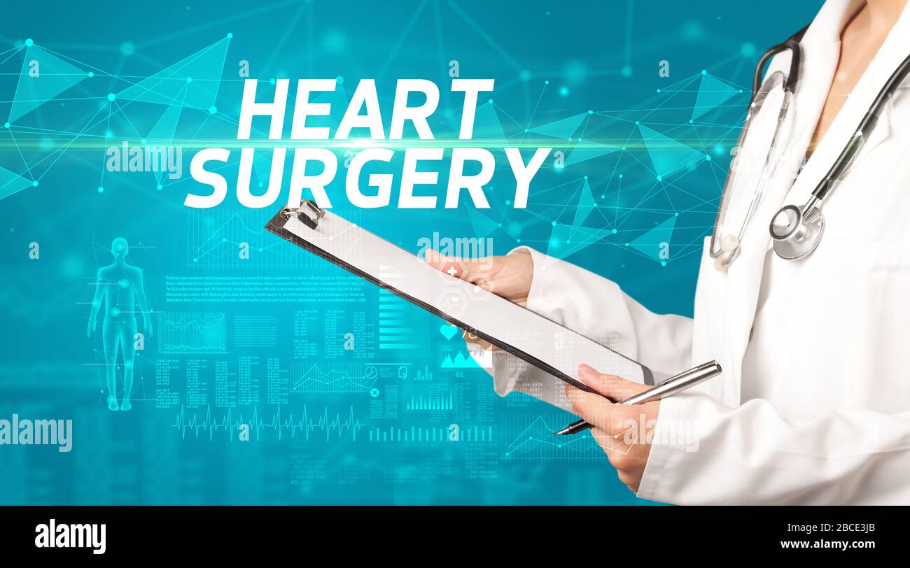 doctor writes notes on the clipboard with HEART SURGERY inscription ...