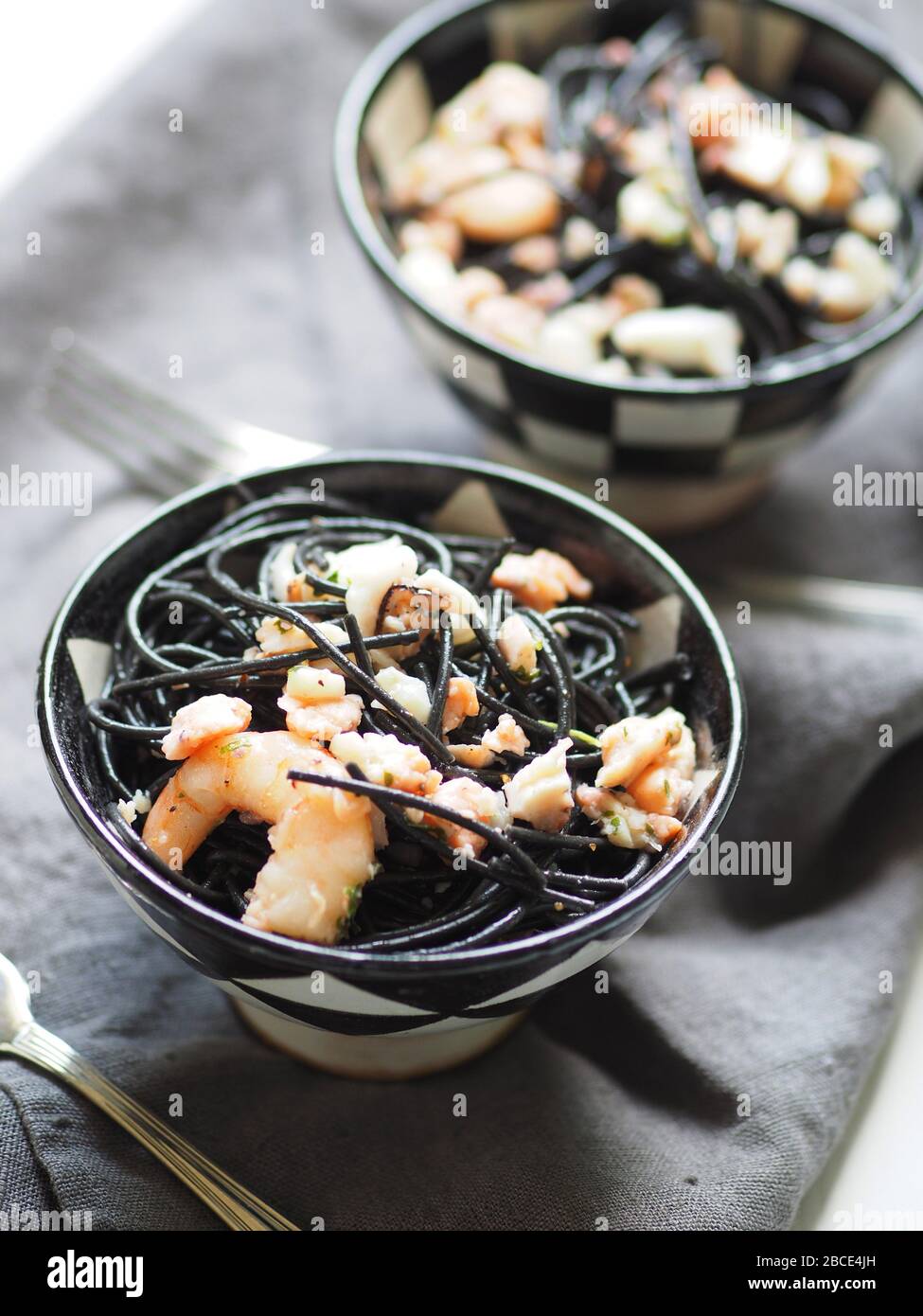 Spaghetti pasta with squid ink, Italy, Europe Stock Photo - Alamy