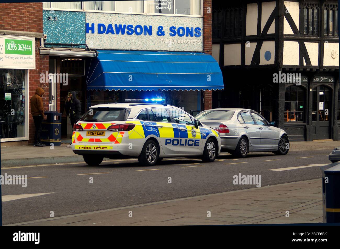 Blue and yellow police car hi-res stock photography and images - Alamy