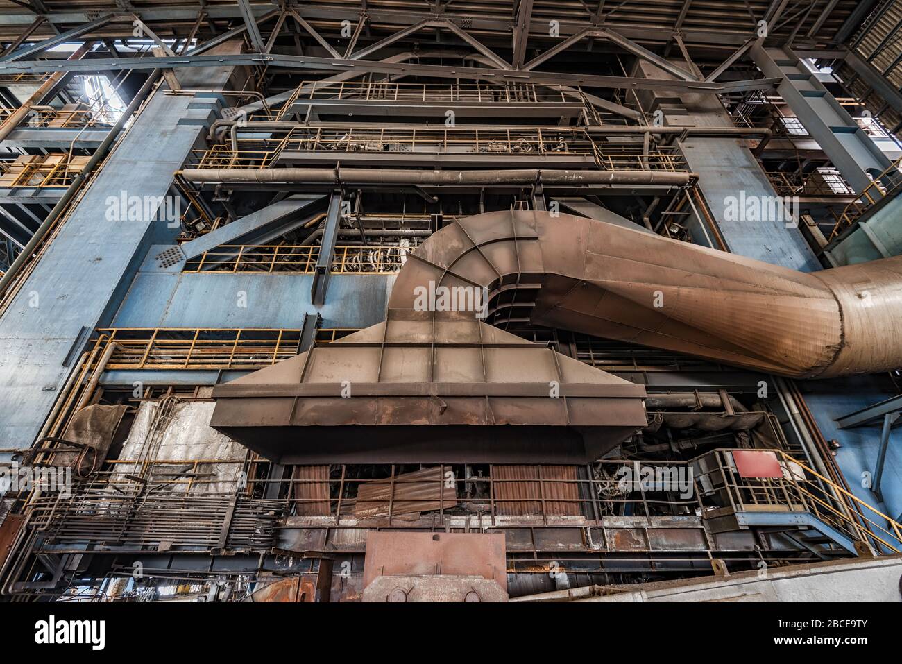Interior of an old abandoned industrial steel factory Stock Photo - Alamy