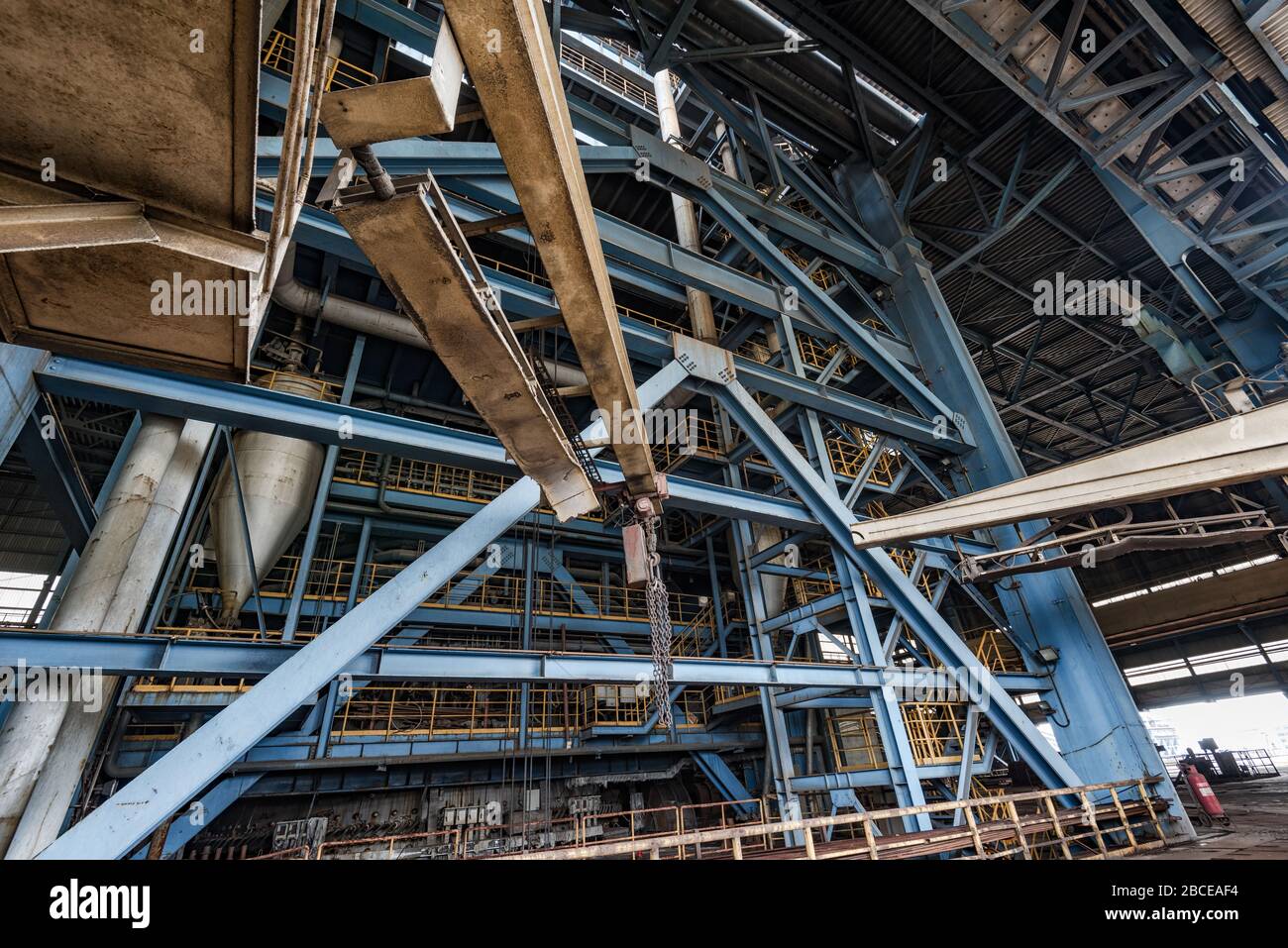 Interior of an old abandoned industrial steel factory Stock Photo - Alamy